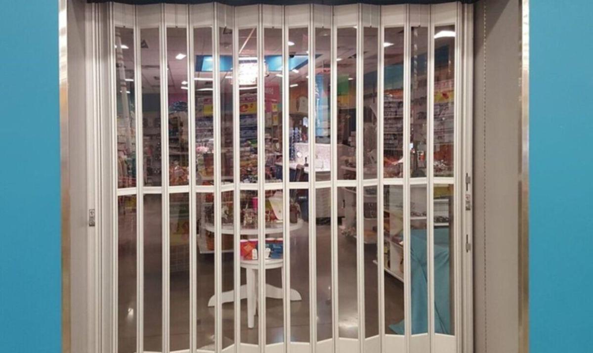 Side Folding Full Enclosure Grilles Overhead Door of Grand Island